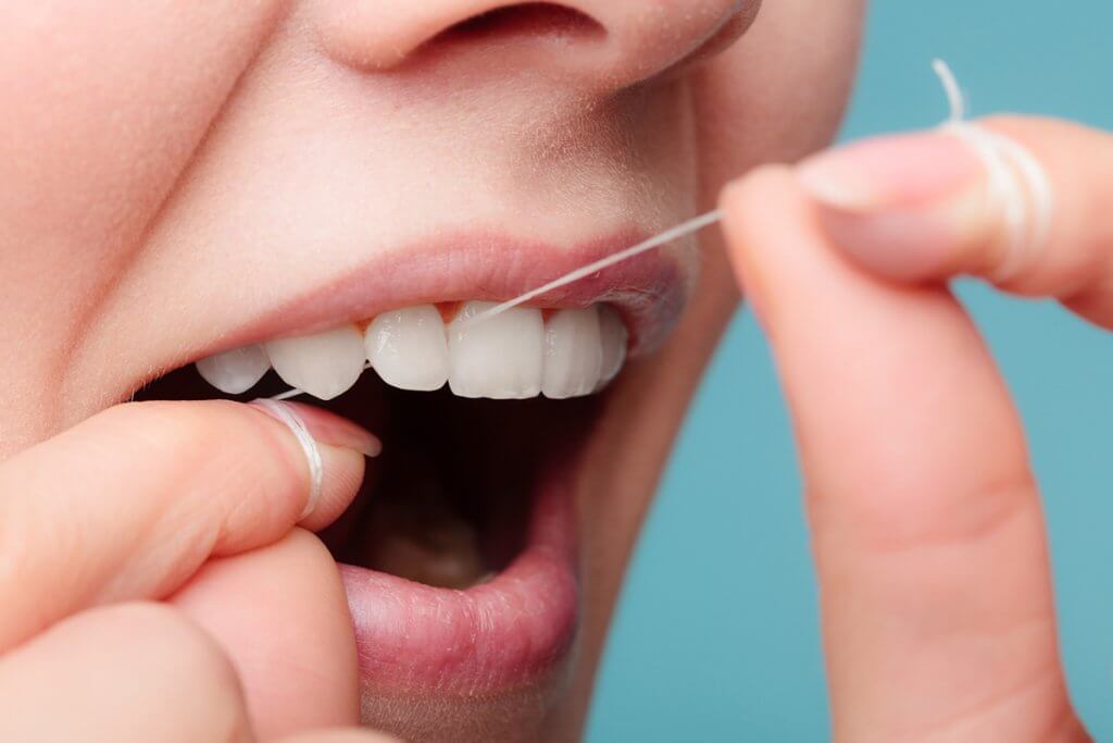 Is Bleeding While Flossing Normal? Here’s What It Could Mean ...